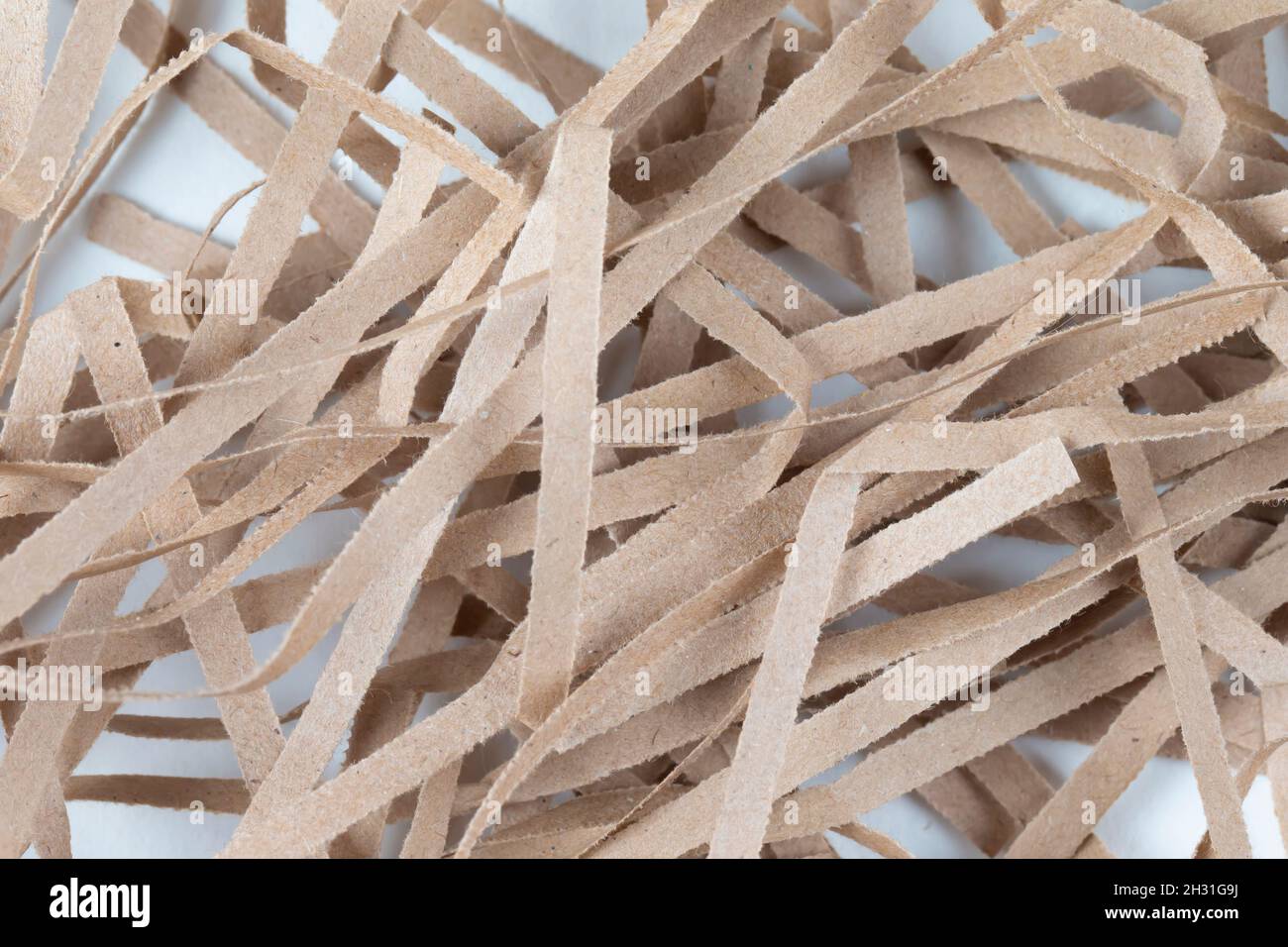 Torn paper strips close-up. A bunch of shredded cardboard Stock Photo ...