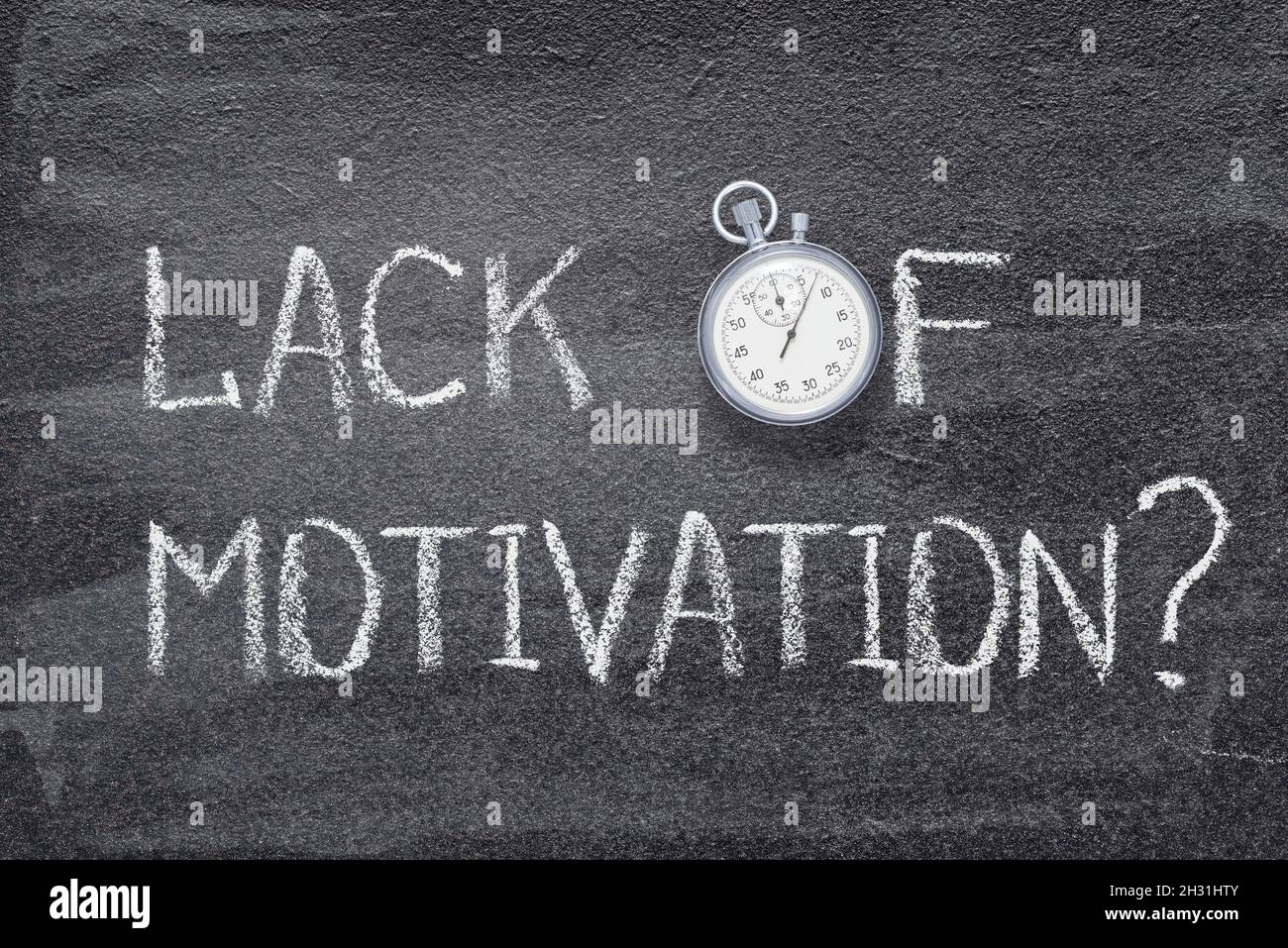 lack of motivation question written on chalkboard with vintage precise ...