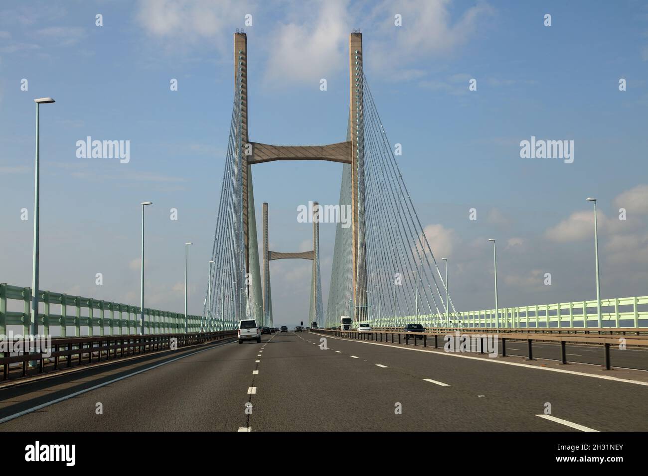The newer Prince of Wales suspension bridge spanning the tidal river ...