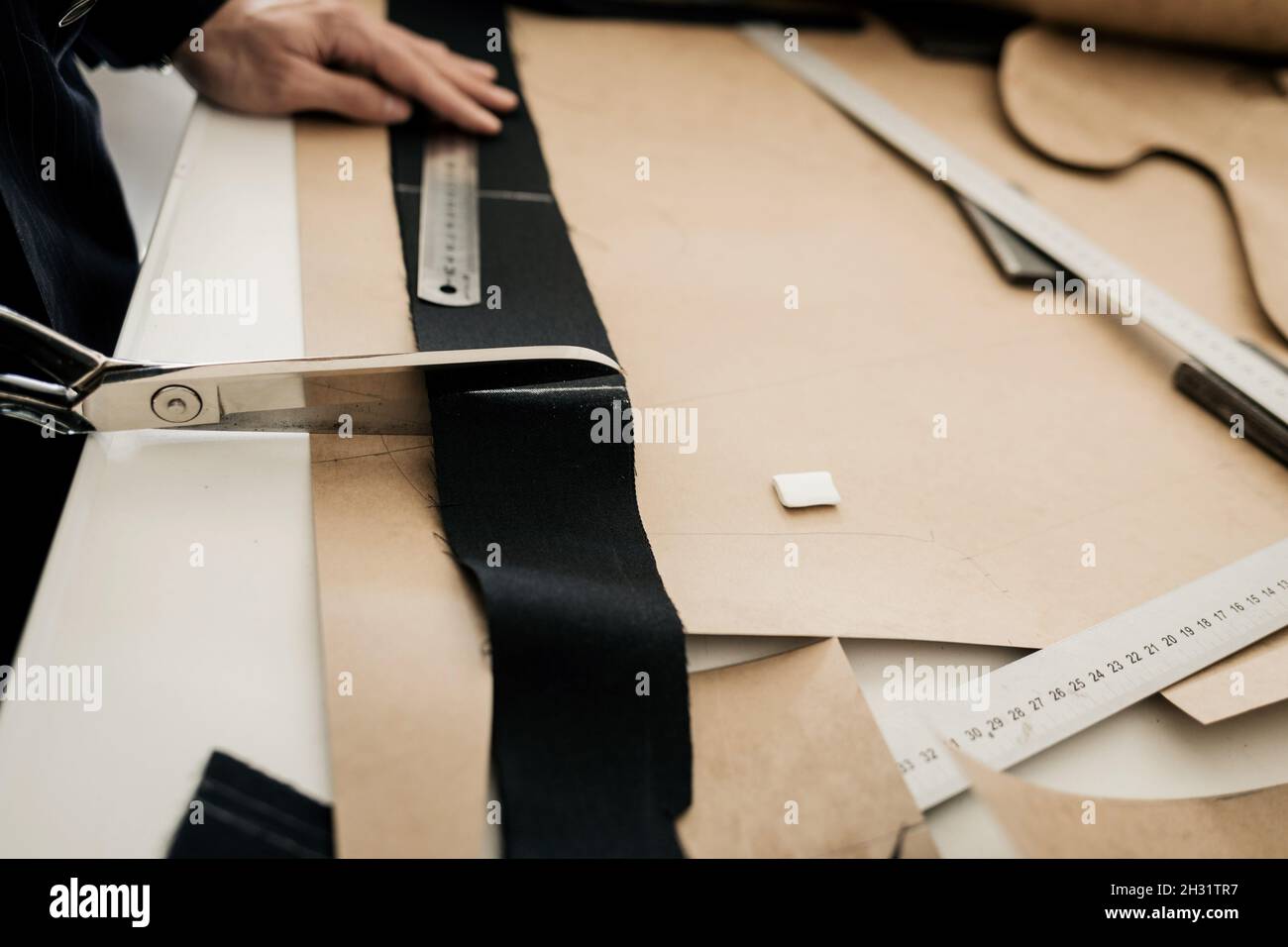 Tailor cutting suit hi-res stock photography and images - Alamy