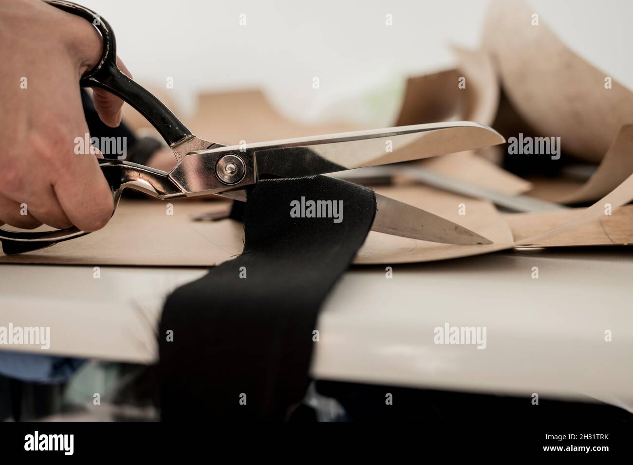 Fashion designer cutting cloth in hi-res stock photography and images ...