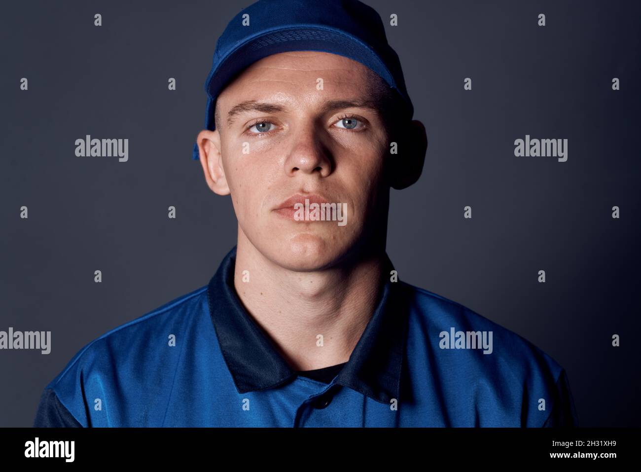 blue uniform worker official service job Stock Photo - Alamy
