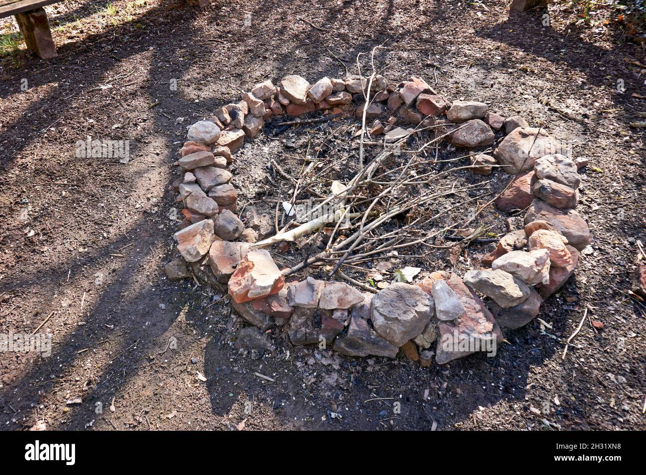 place for a campfire in the woods. a circle of stones for a picnic in ...