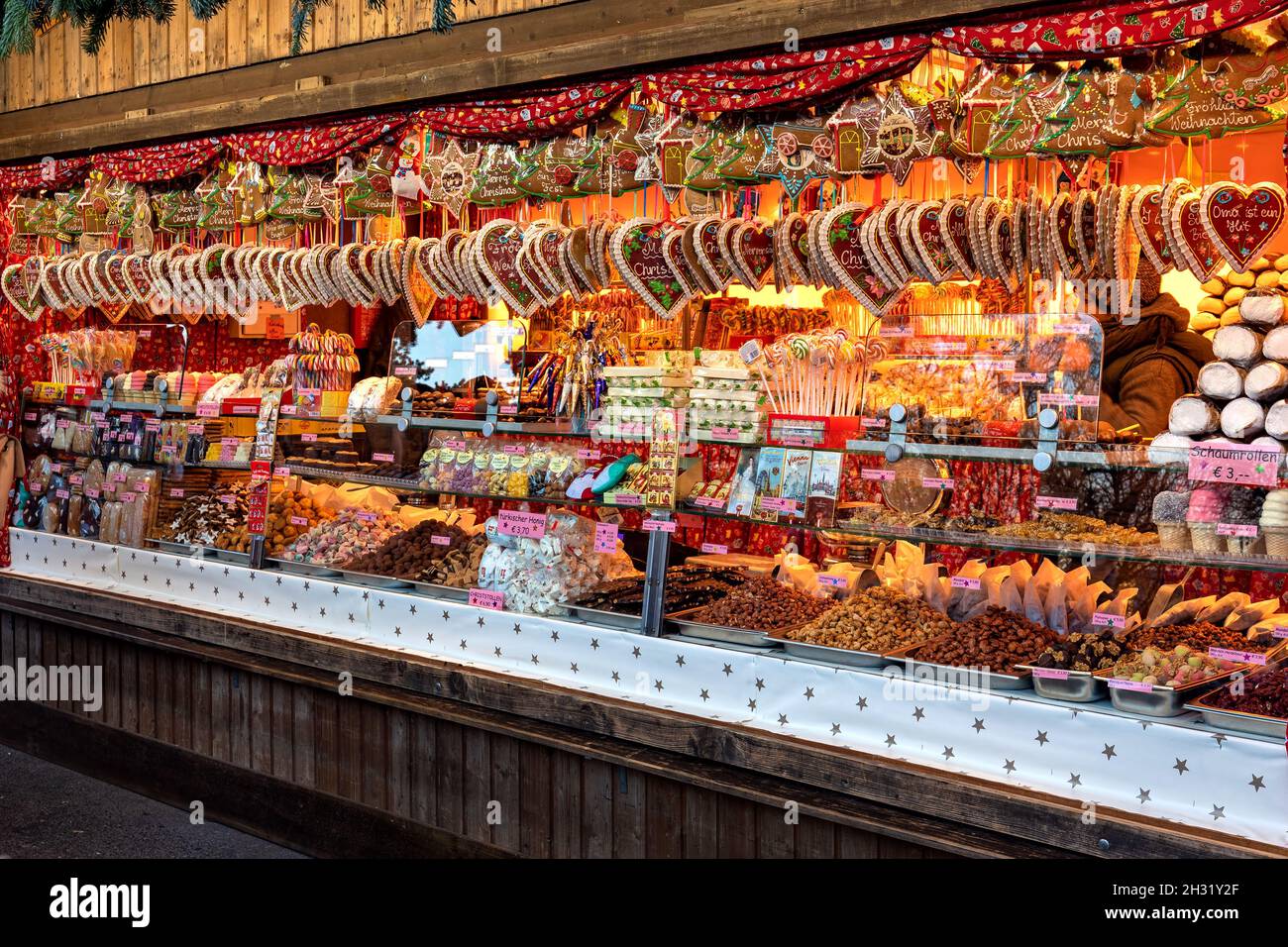 Heart-shaped gingerbread cookies and other traditional sweets on sale ...