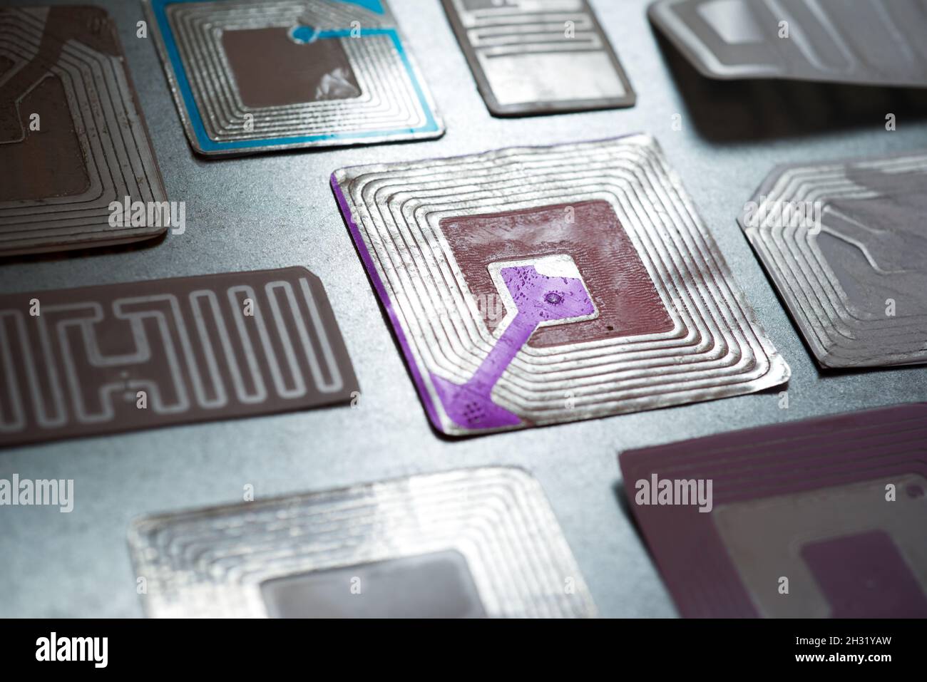 Rfid tags on a metal table Stock Photo - Alamy