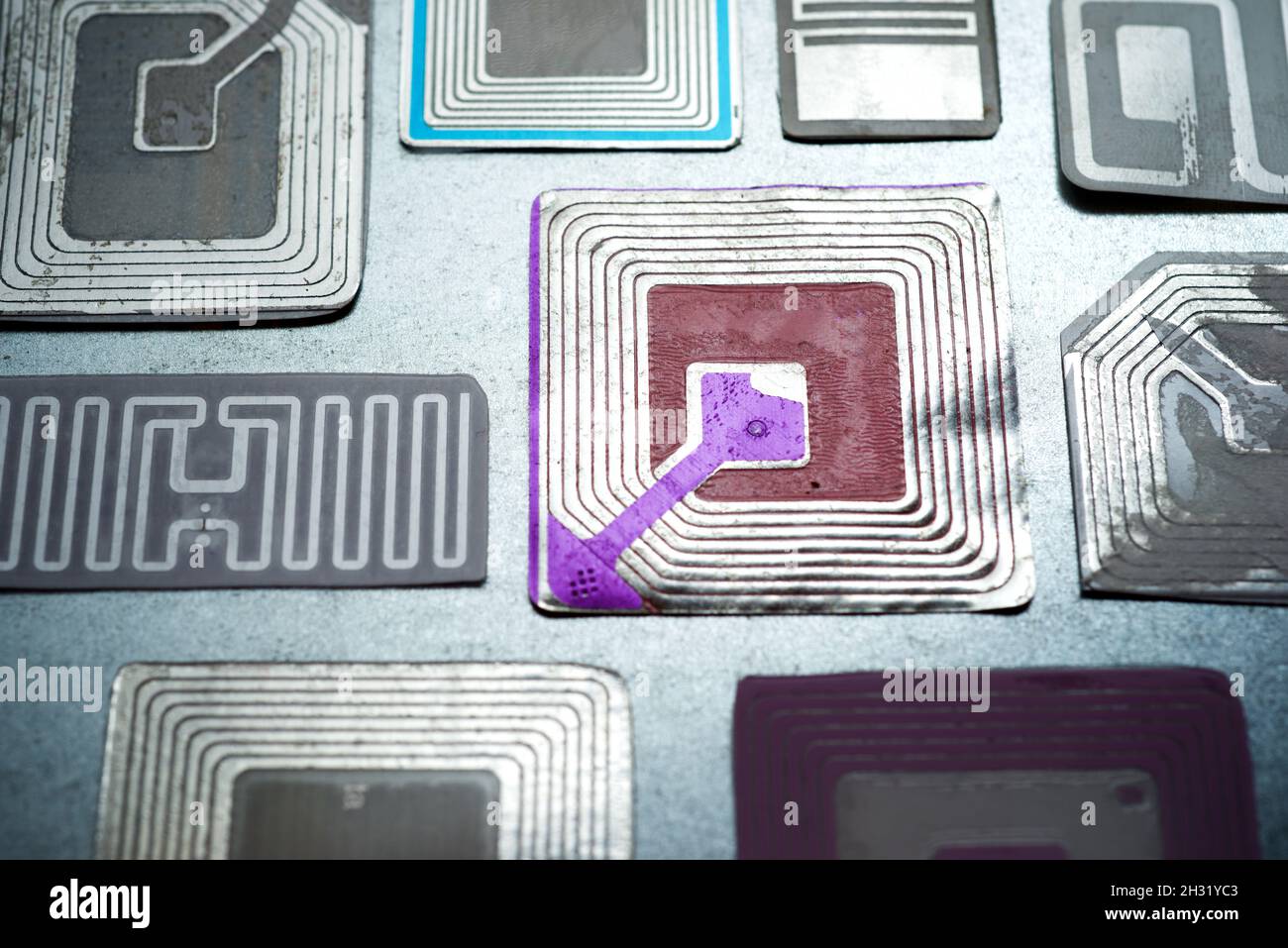 Rfid tags on a metal table Stock Photo - Alamy