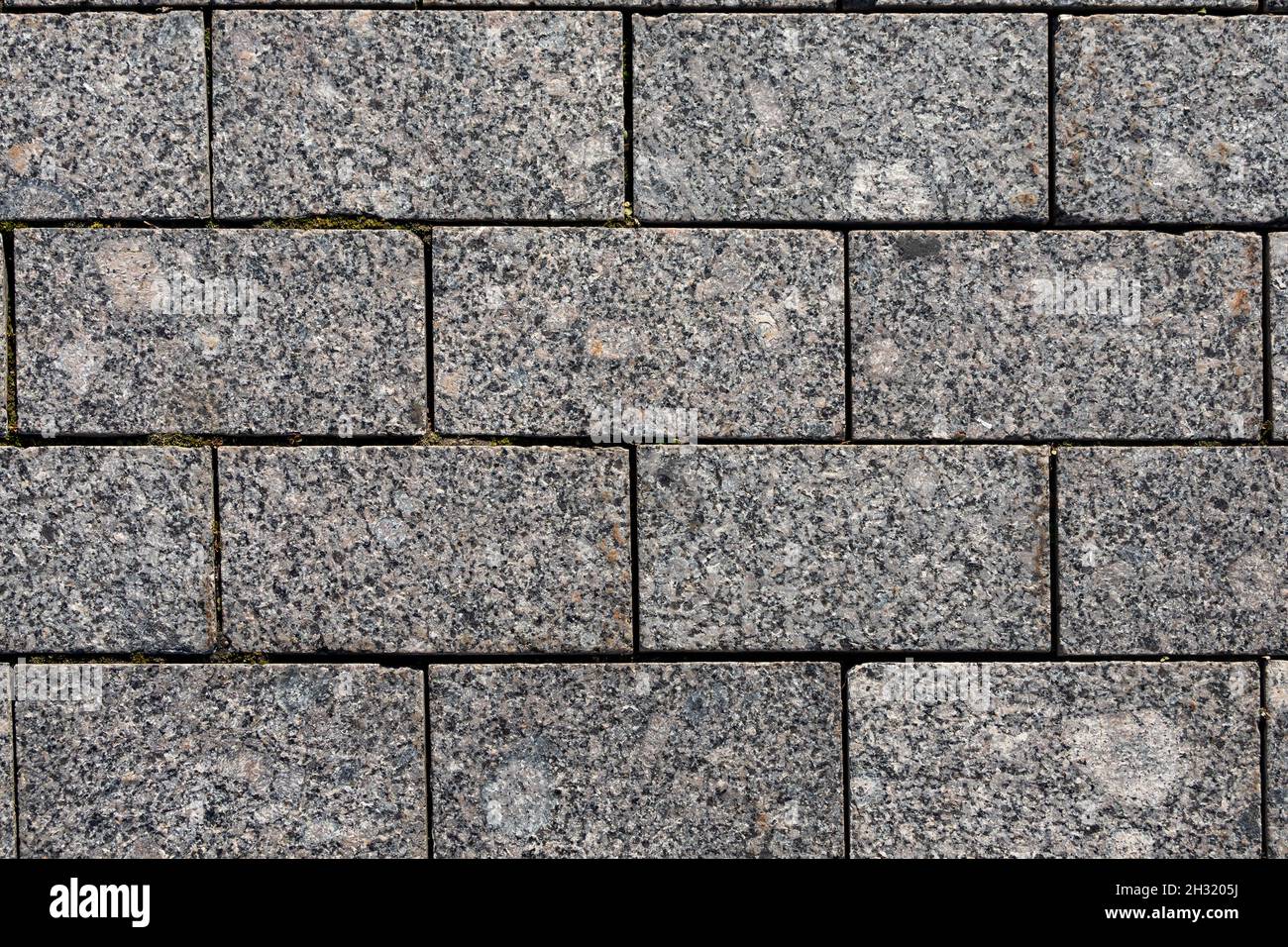 The road is paved with gray stones, top view. stone texture, outdoor ...