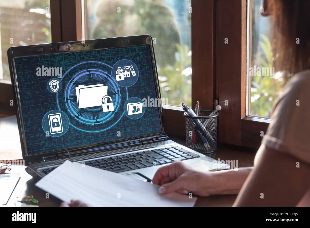 Laptop screen displaying a confidential data concept Stock Photo - Alamy