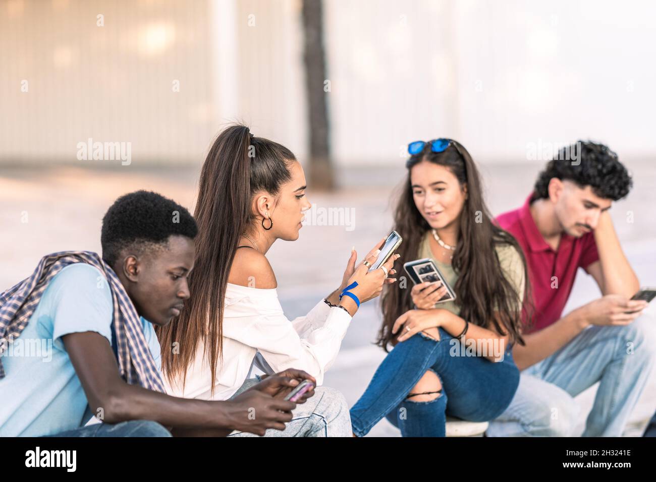 Mobile multiracial hi-res stock photography and images - Alamy