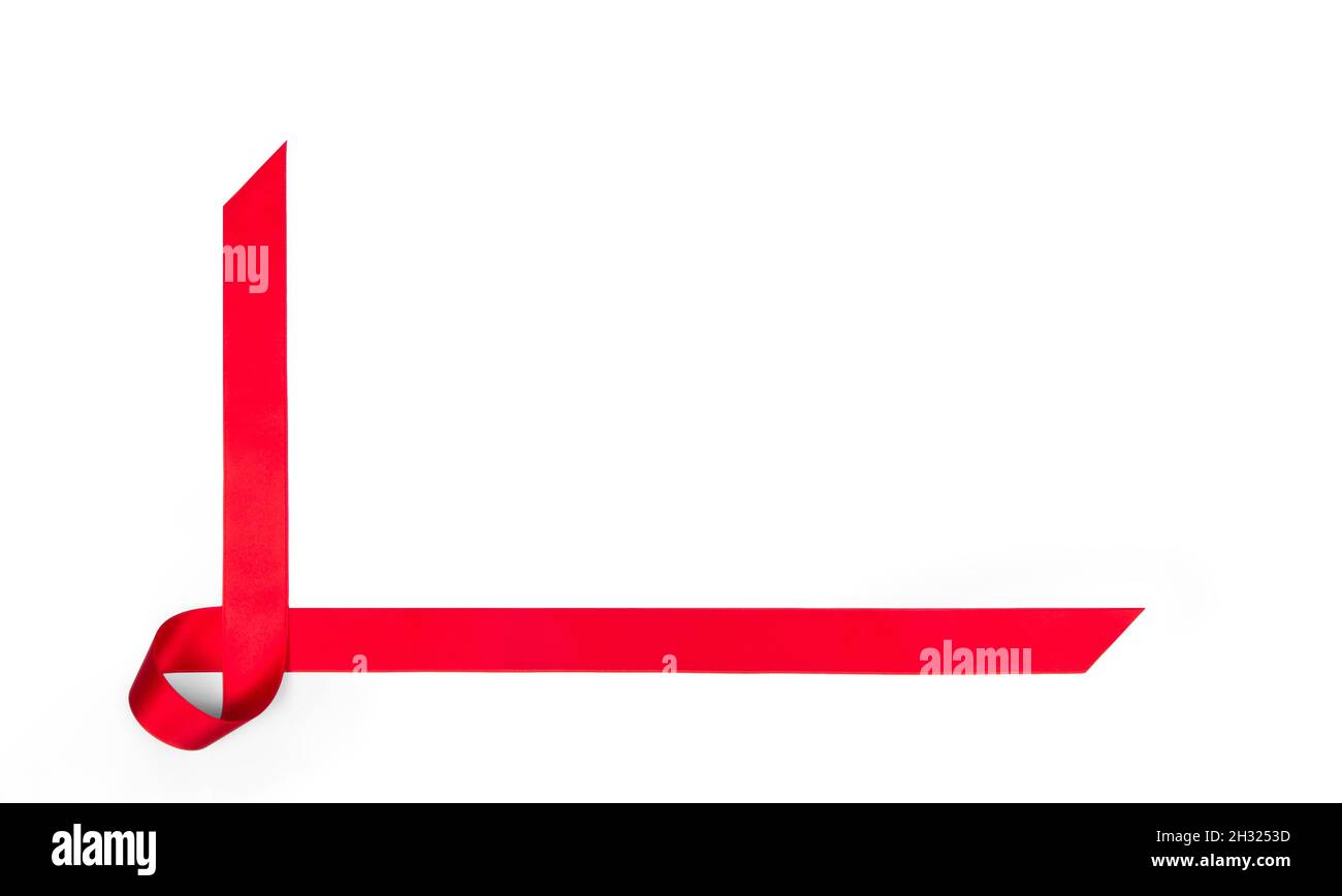 Red streamer ribbon on white background Stock Photo - Alamy