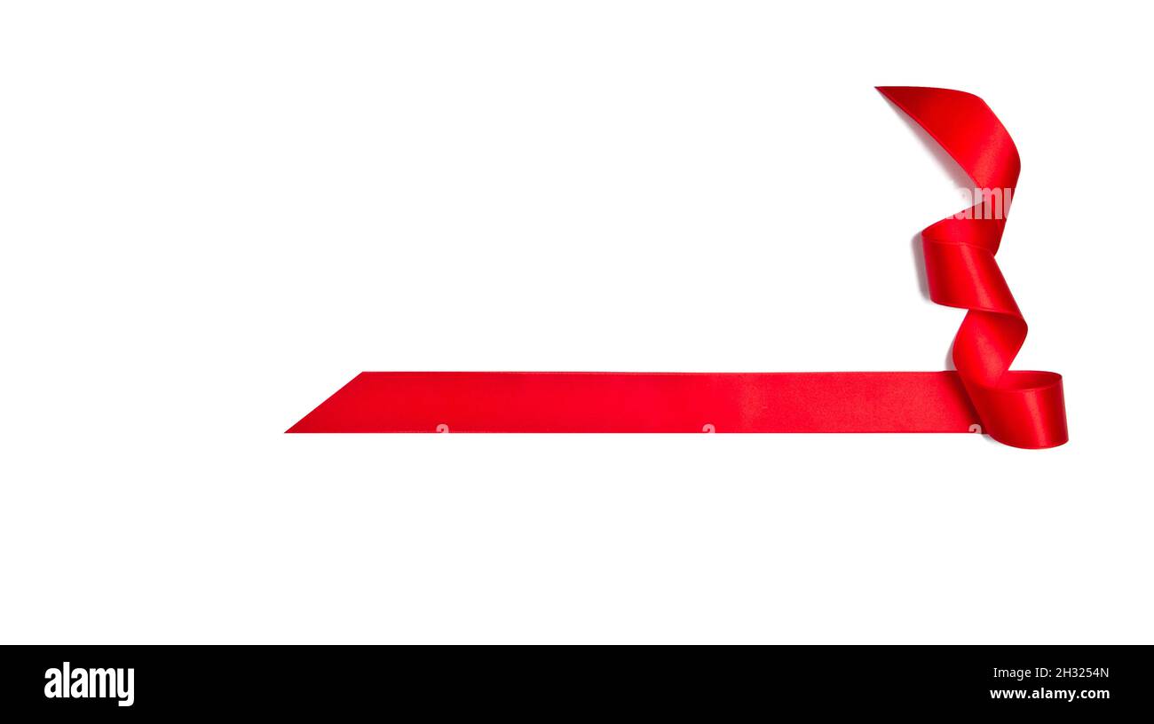 Red streamer ribbon on white background Stock Photo - Alamy