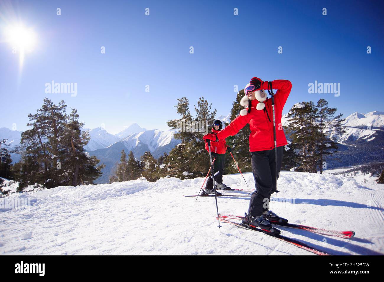 people ski Alpine mountains with white snow and blue sky Stock Photo ...