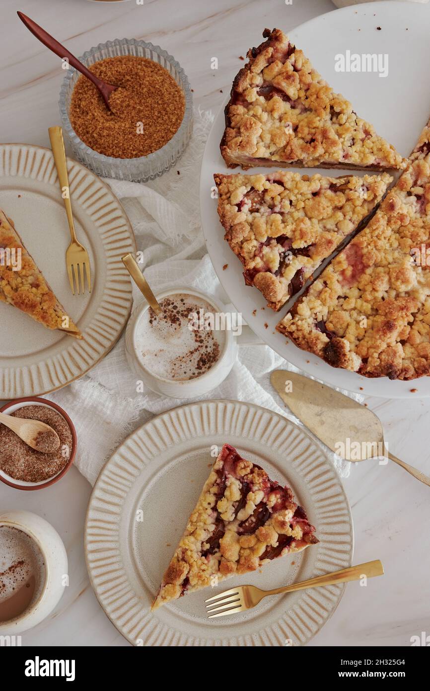 Top view of the slices of a delicious homemade crumble pie with berries ...