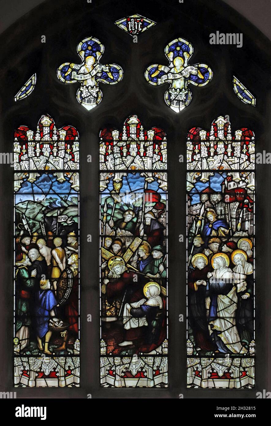 A stained glass window by the Kempe Studio. depicting Christ carrying ...