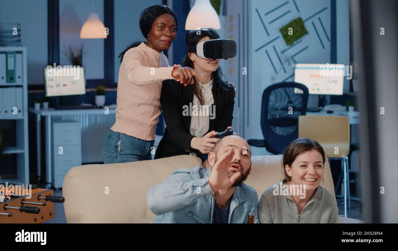 Diverse workers celebrate playing hi-res stock photography and images ...