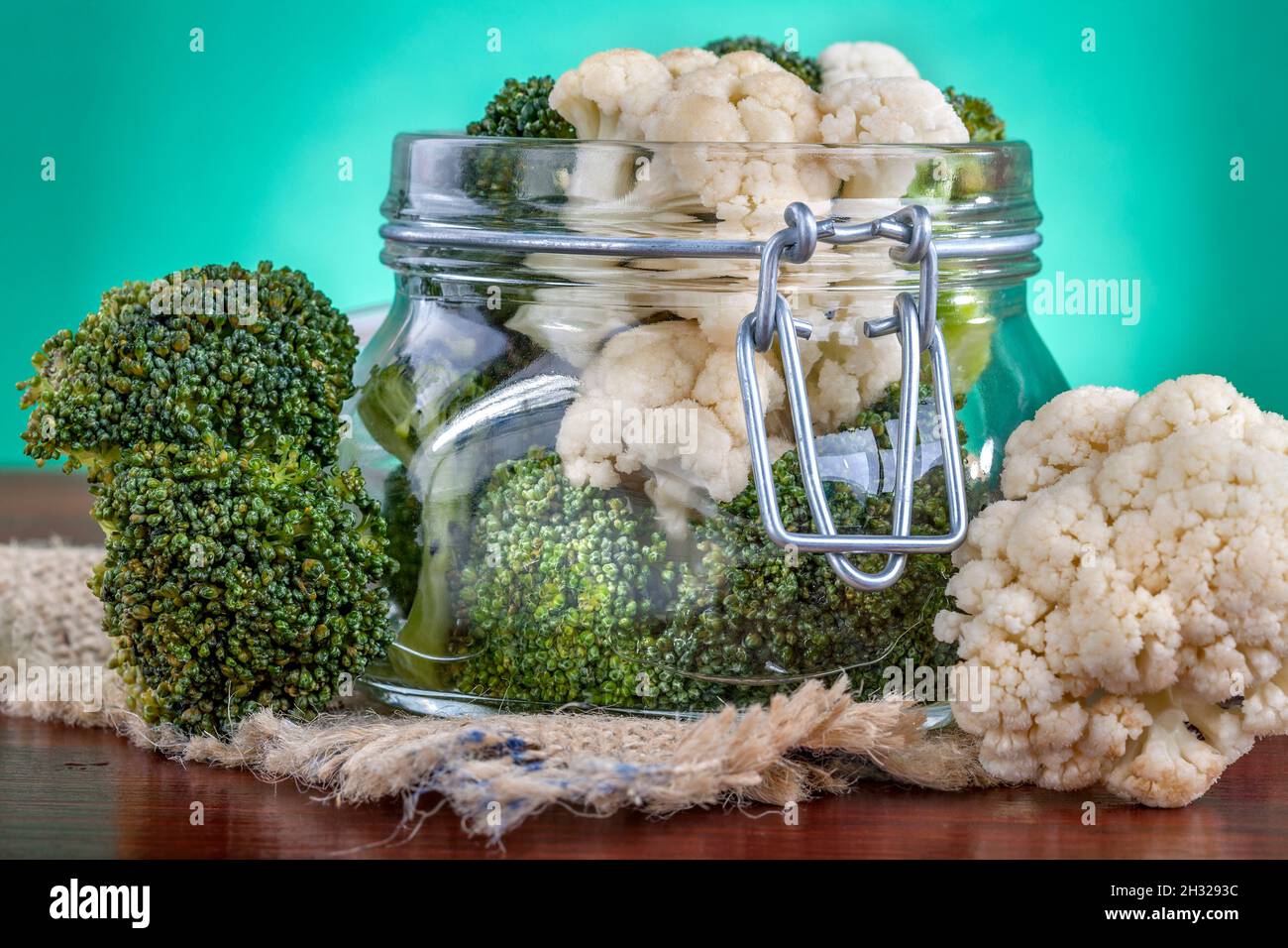 Domestic healthy canned broccoli on a wooden table Stock Photo - Alamy