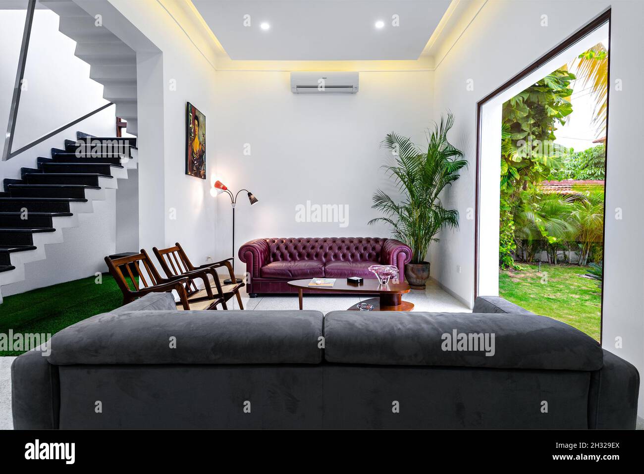 LA HABANA, CUBA - Apr 17, 2019: The cozy interior with two sofas ...