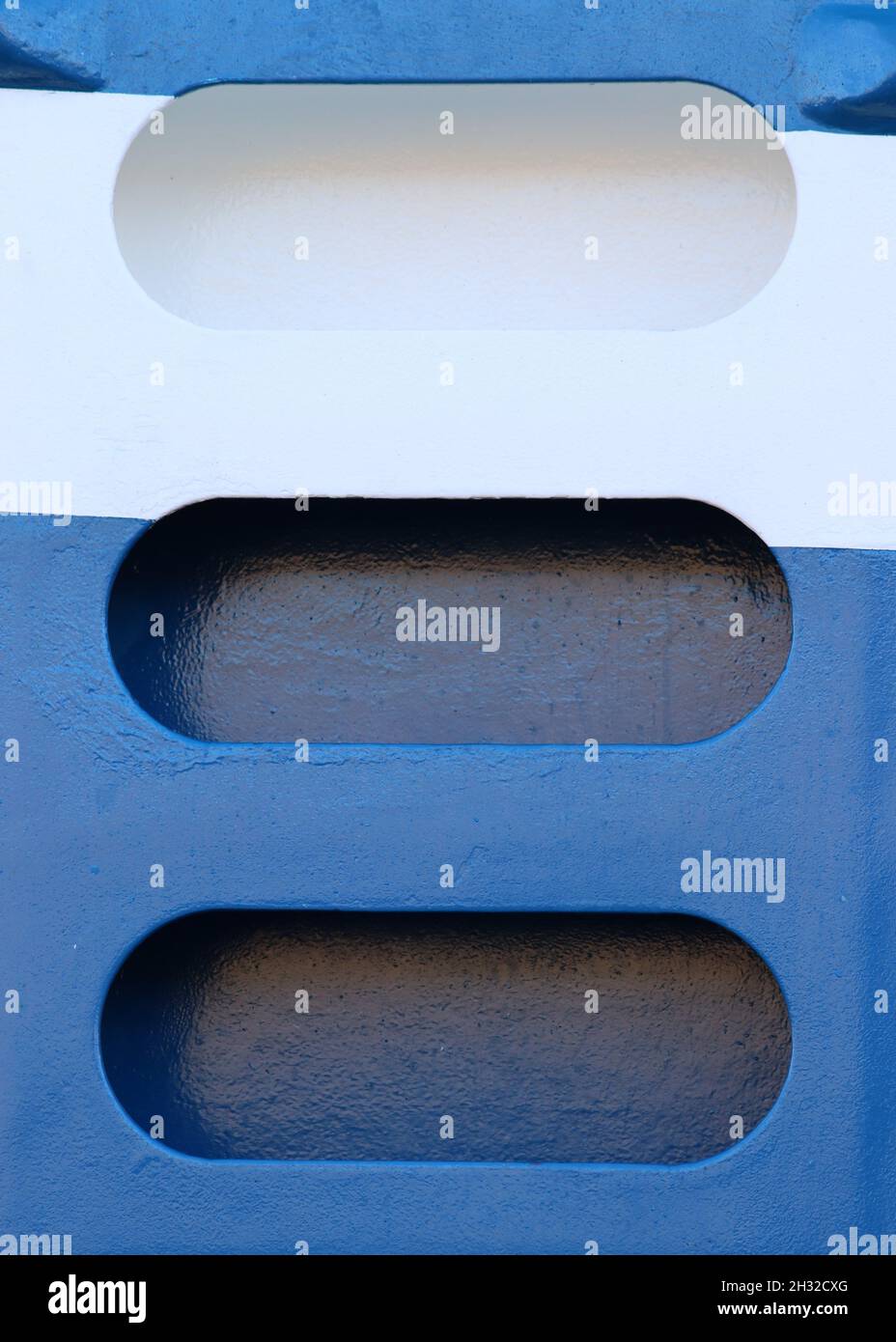 Blue and white shapes on fishing boat Stock Photo - Alamy