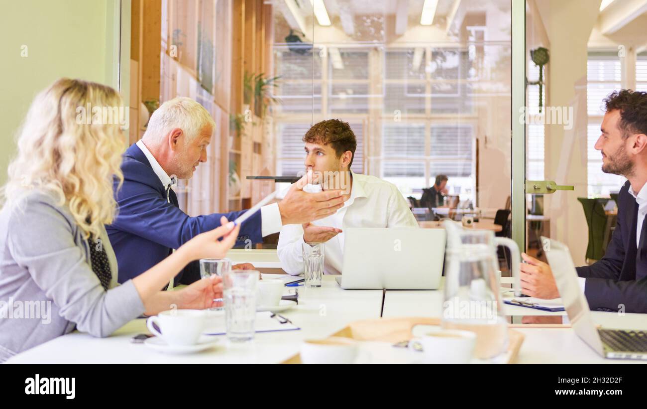 Business people in start-up business meeting during a strategy ...