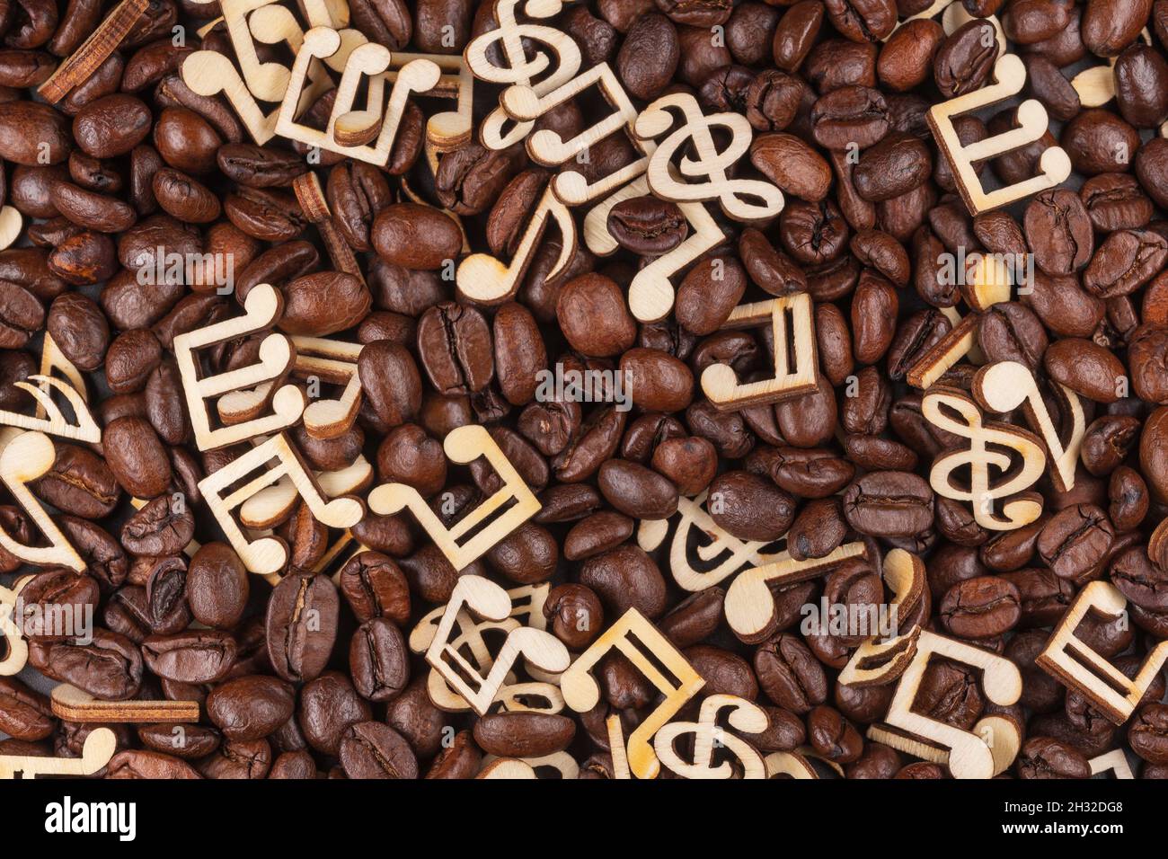 Abstract conceptual background made of mixed coffee beans and wooden ...