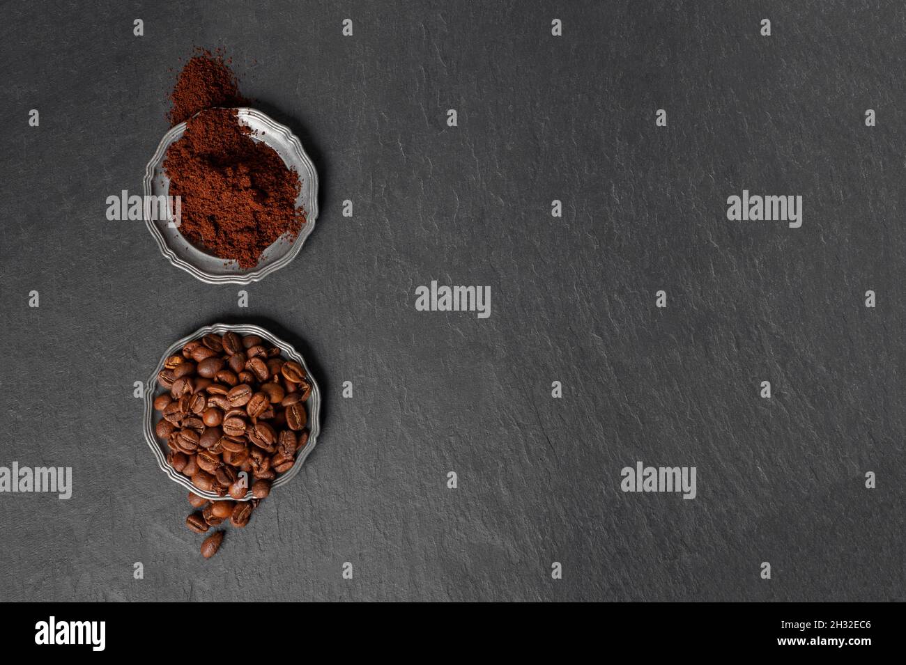 Two plates of coffee. one with coffee beans and the other with ground ...