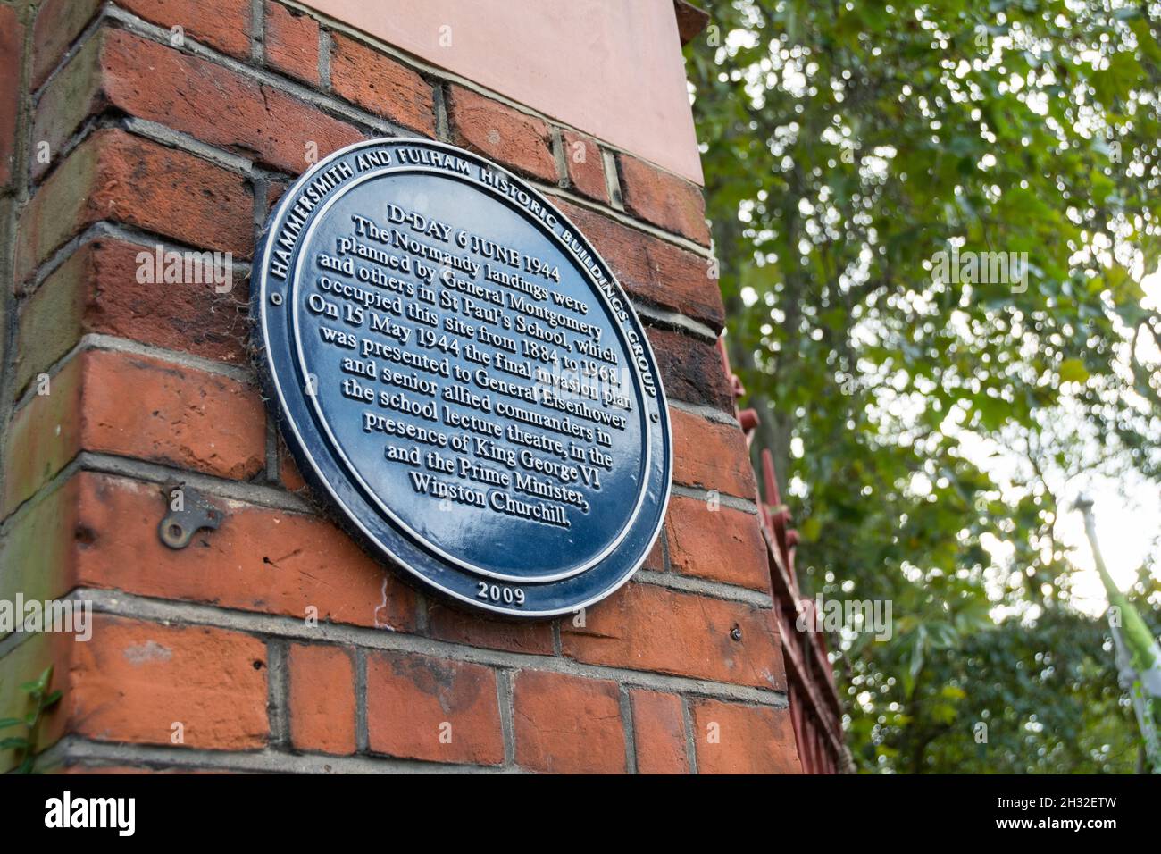 Blue plaque and signage outside the former site of St Paul's School ...