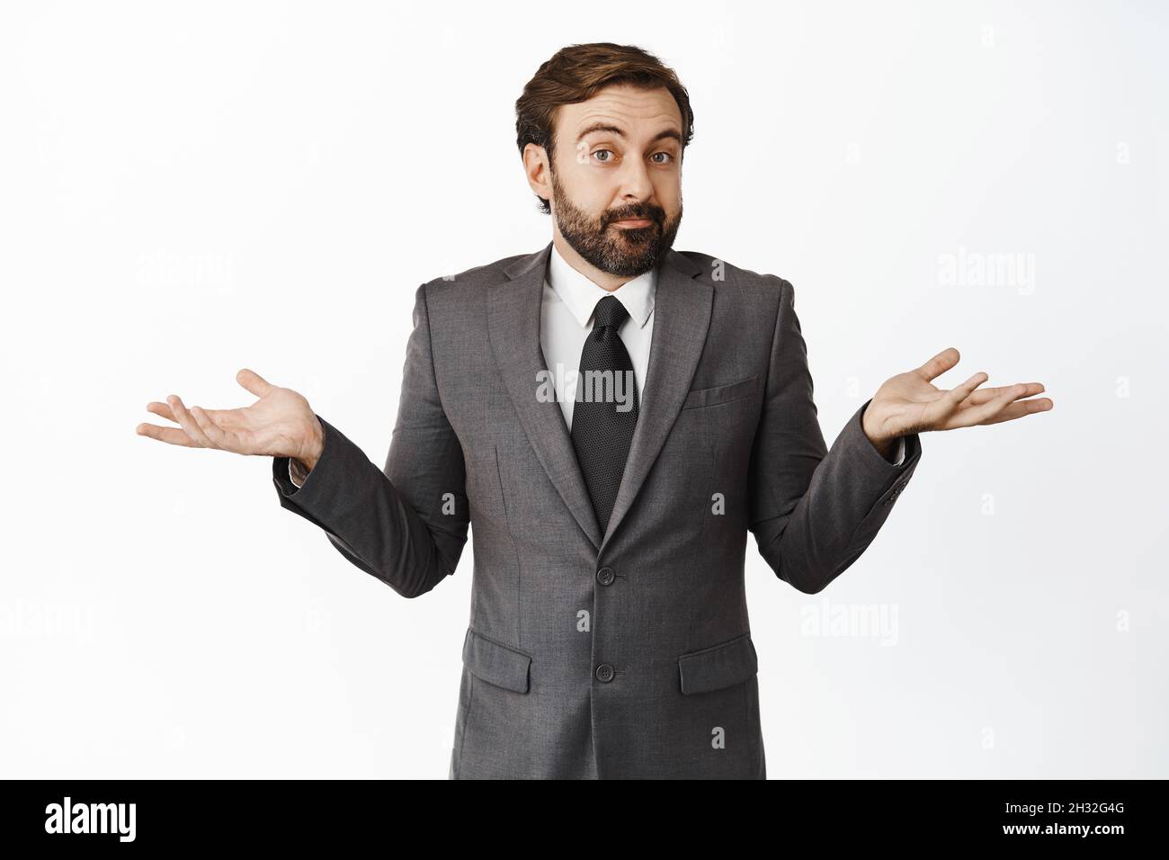 Businessman Shrugging Shoulders High Resolution Stock Photography and ...