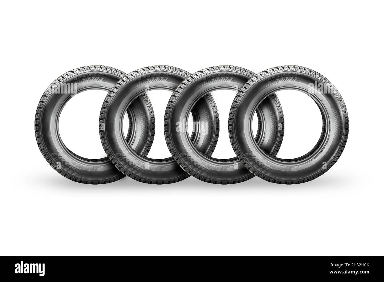 four new tires, side view. isolate on a white background Stock Photo ...