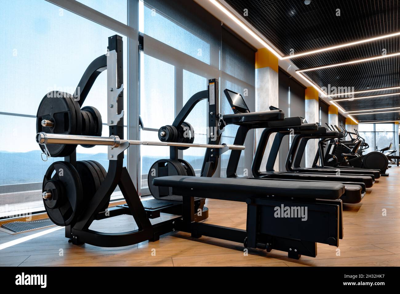 Modern gym interior with new fitness equipment Stock Photo - Alamy