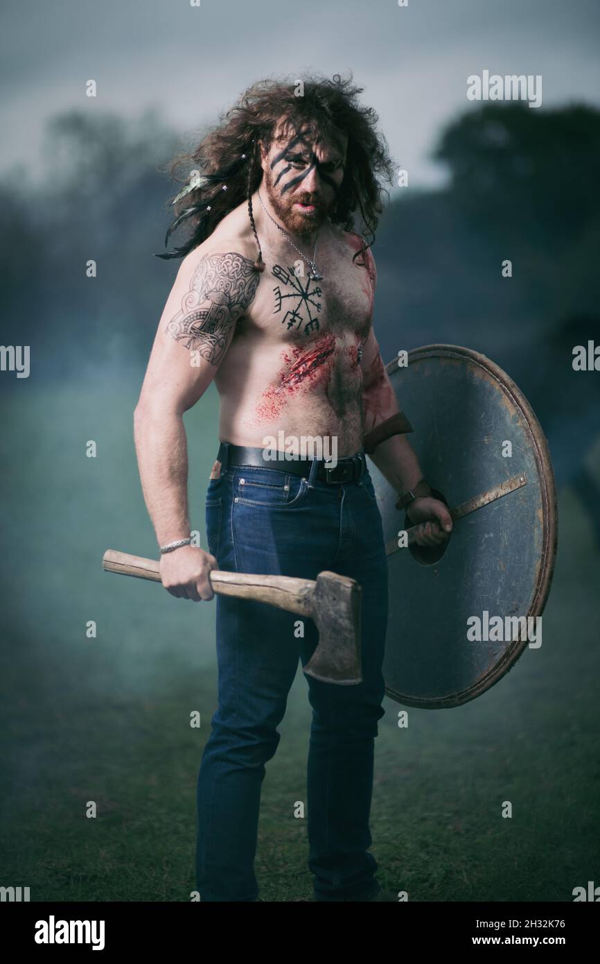 Medieval warrior berserk Viking portrait with tattoo on skin, cuts on ...