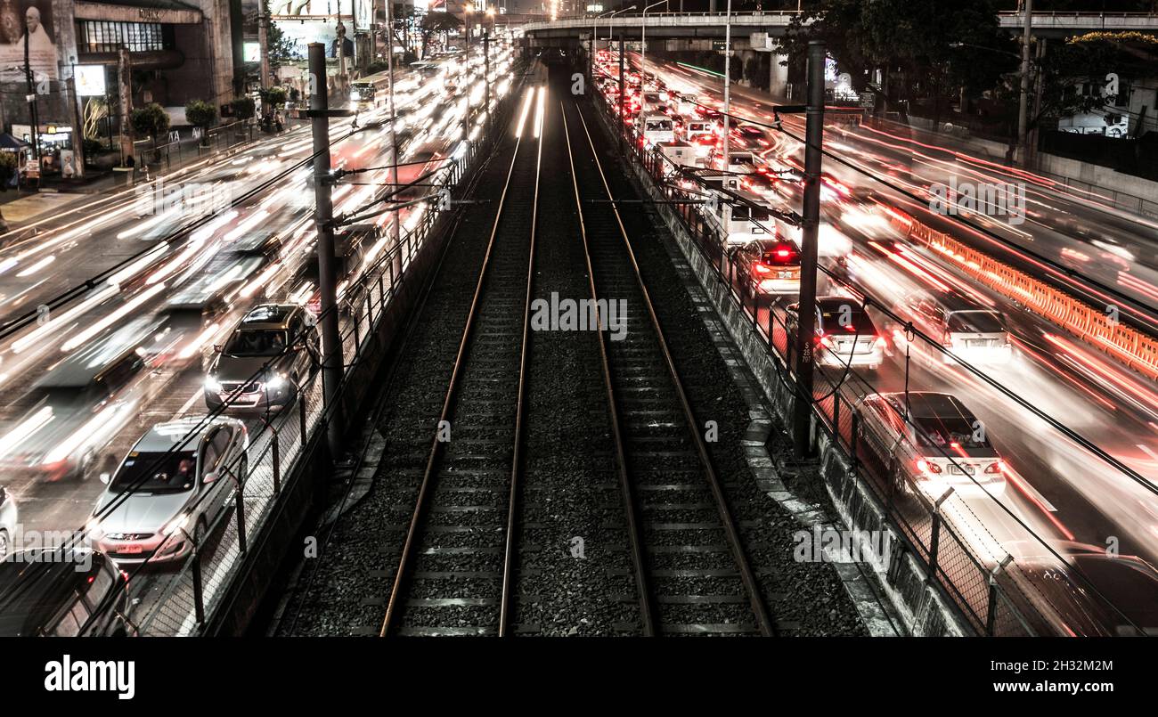 trail lights from vehicles stuck in traffic jam in a city highway in ...