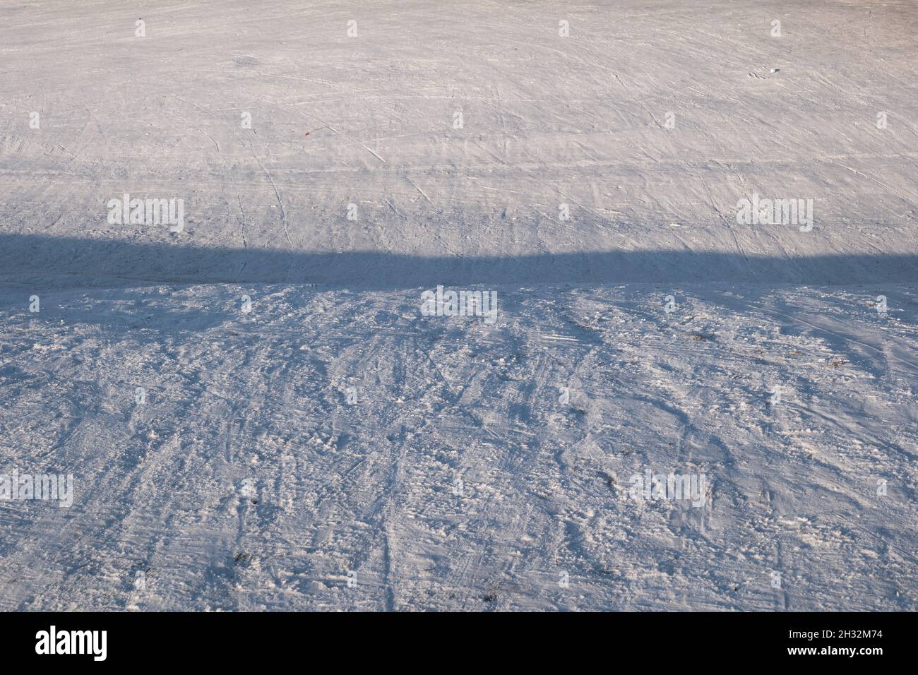 Winter slope background, top of a hill view of snow covered ground ...