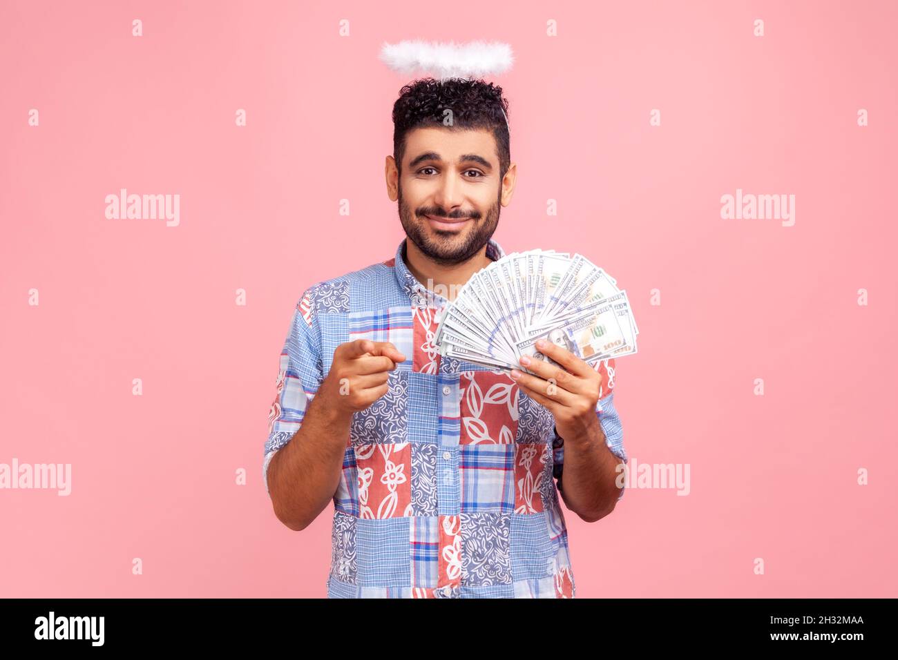 Hey you, make money. Portrait of positive angelic bearded man with halo ...