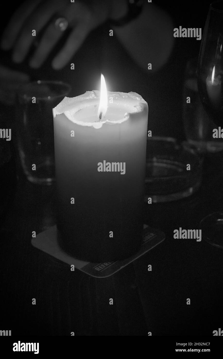 Warm glow candle in Black and White Stock Photos & Images - Alamy