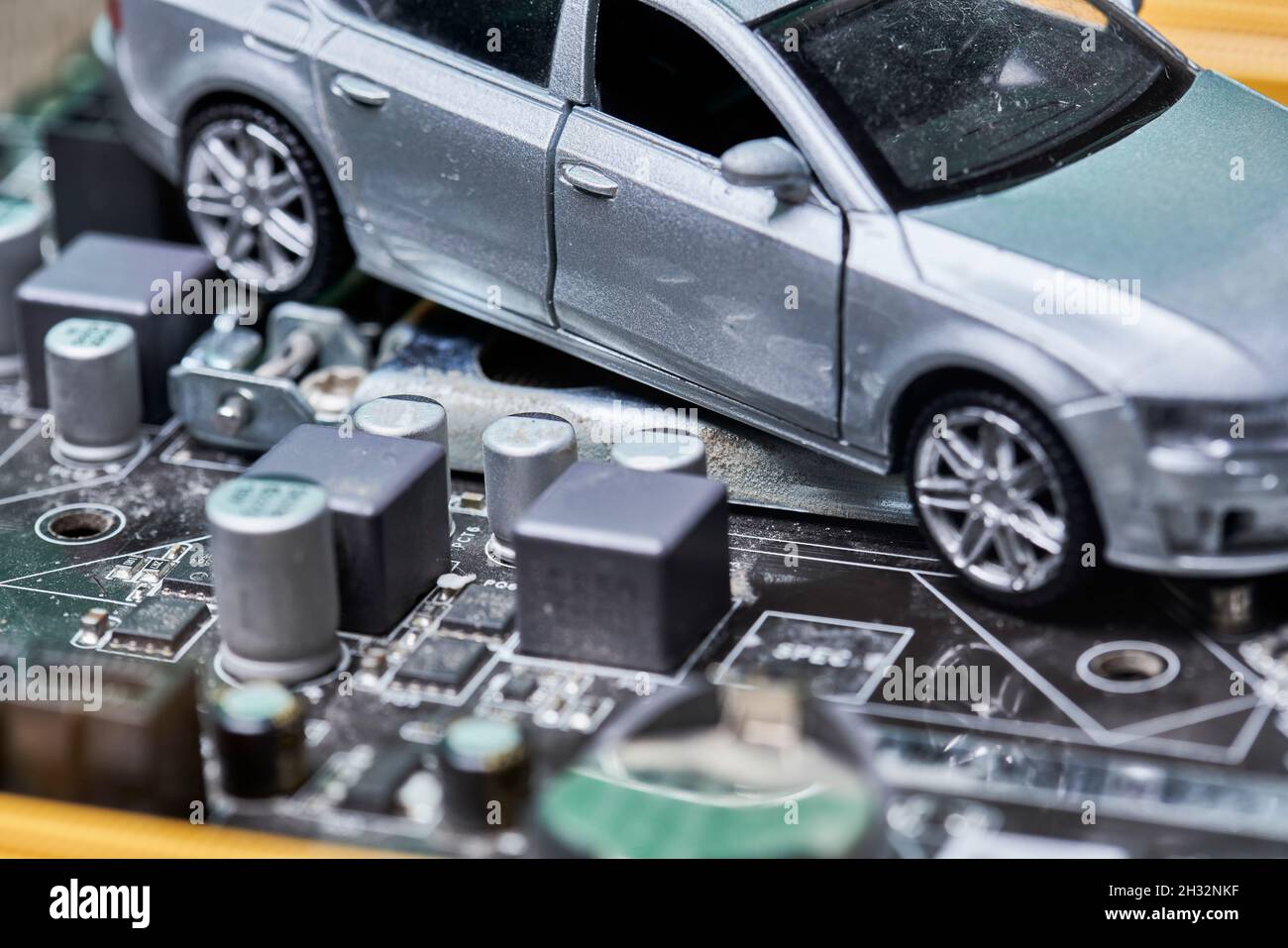 CPU chip and semiconductors with car toy. Global car chip shortage ...