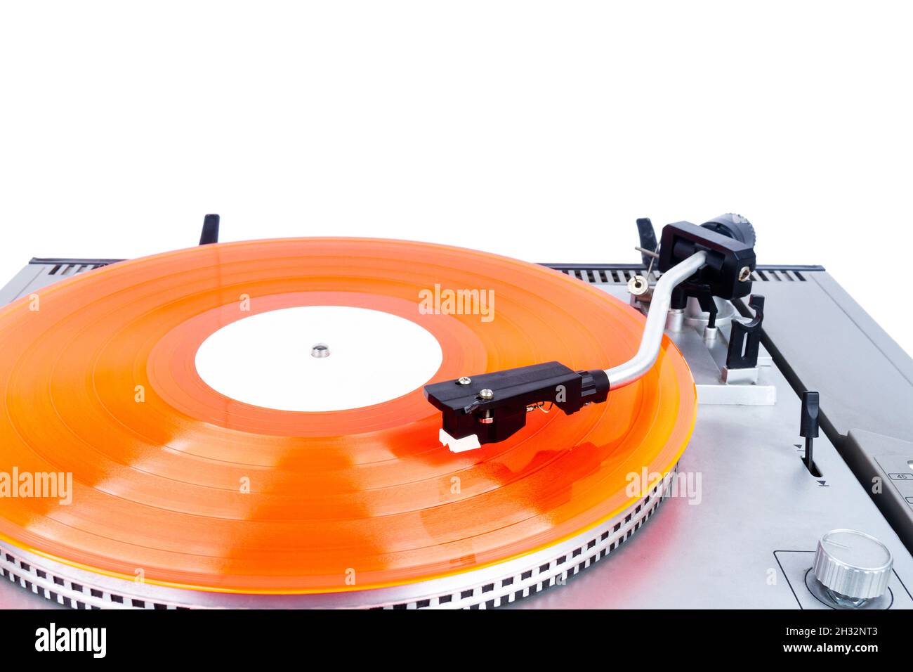 Close up of vintage turntable record player with red vinyl isolated on ...