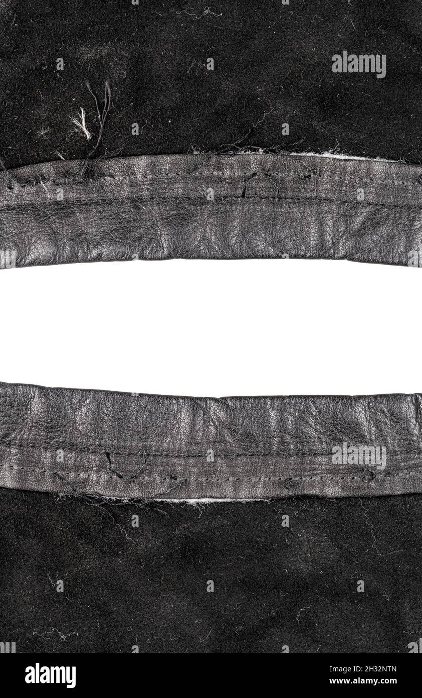 Two pieces of black leather with a space for text isolated on white ...
