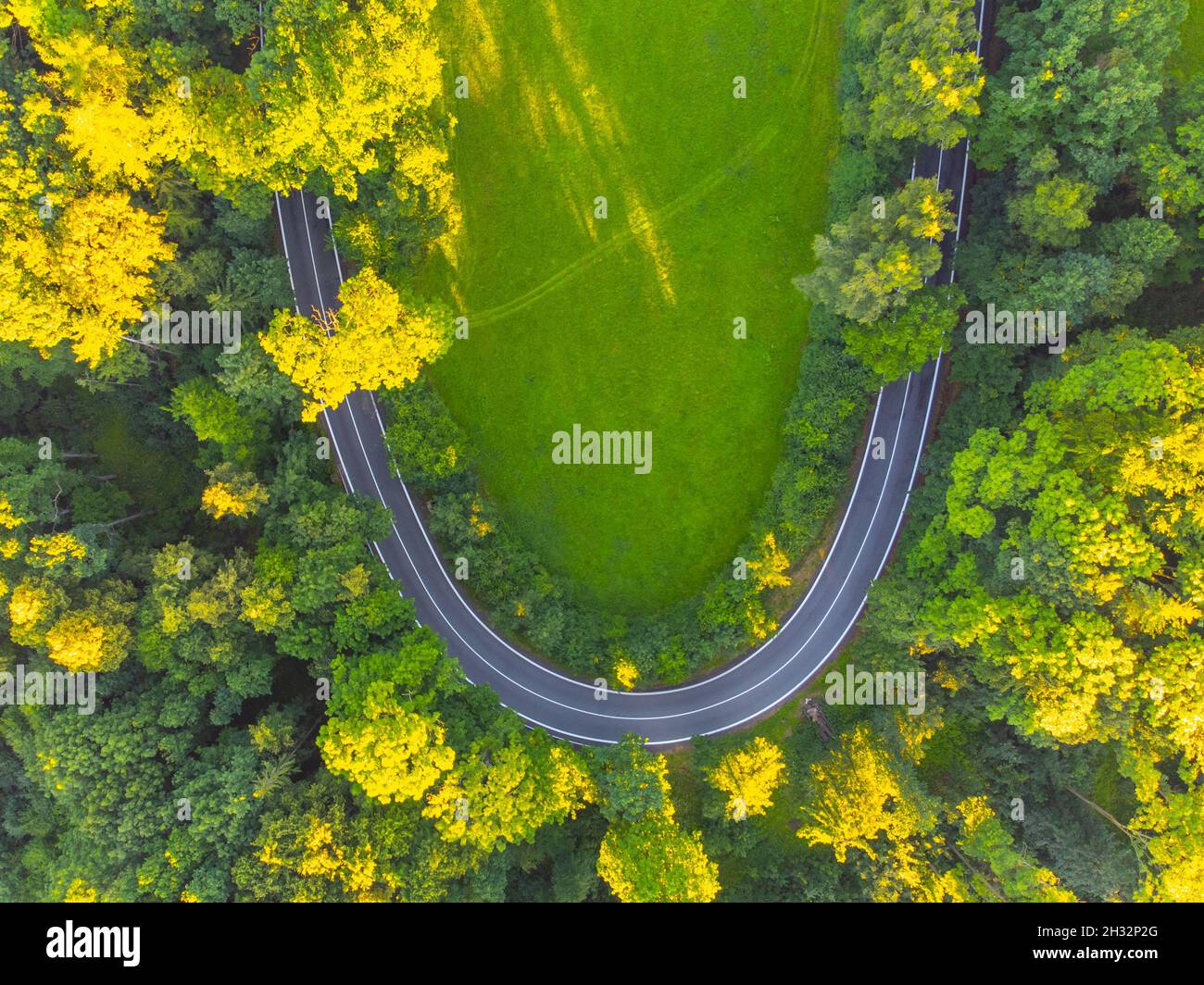 Asphalt road in rural landscape from above Stock Photo - Alamy