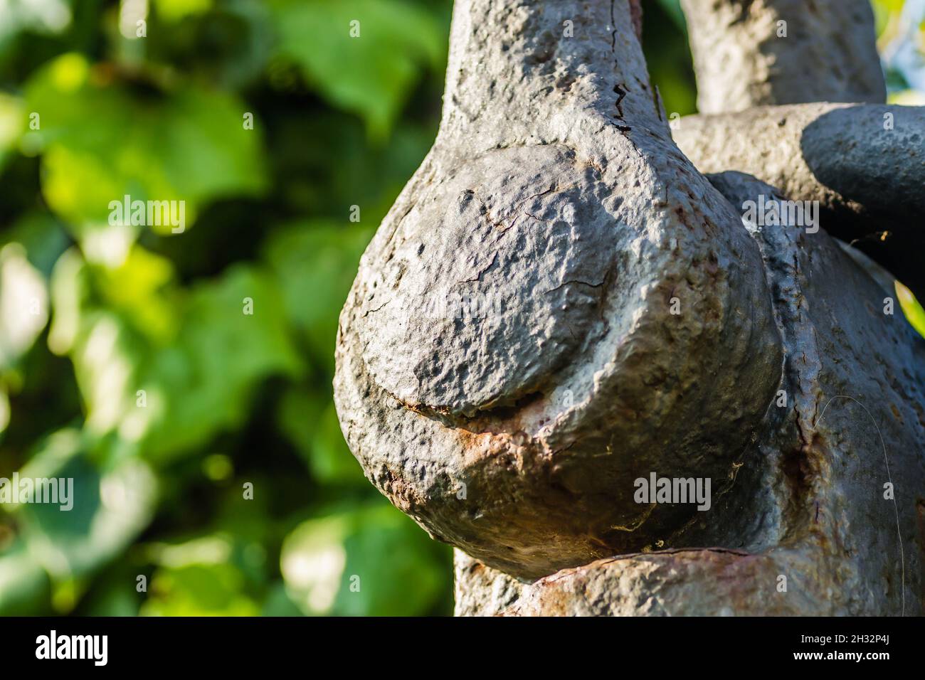 Heavy links of a thick anchor chain - close-up of a museum space in the ...