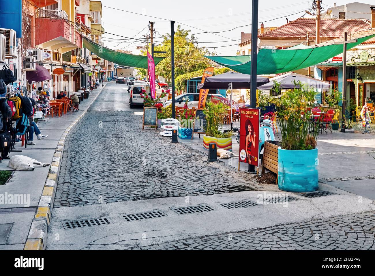 Urla, Turkey - September, 2021: Street, shops, cafes and people in Urla ...