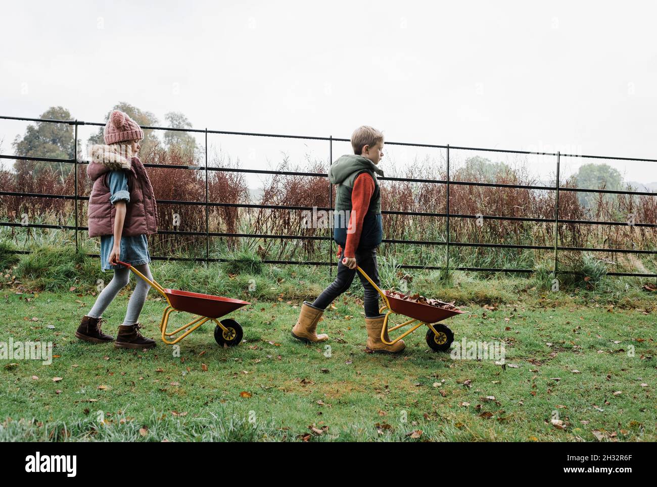 Wheelbarrows children hi-res stock photography and images - Alamy