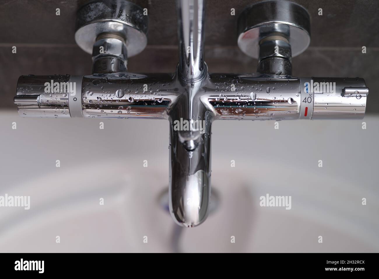 Steel mixer with a temperature sensor in the bathroom, close-up Stock ...