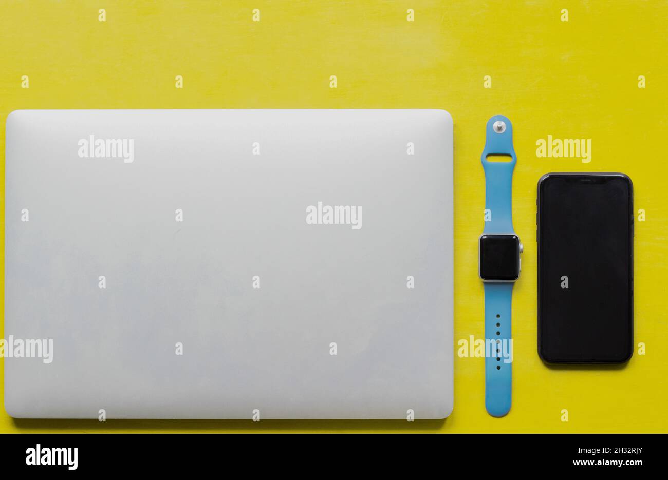 laptop, watch and mobile phone Stock Photo - Alamy