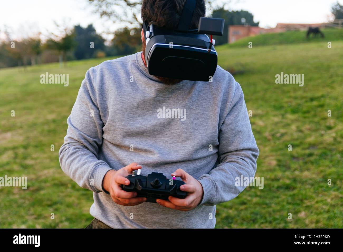 Man with virtual reality goggles and drone control controller Stock ...