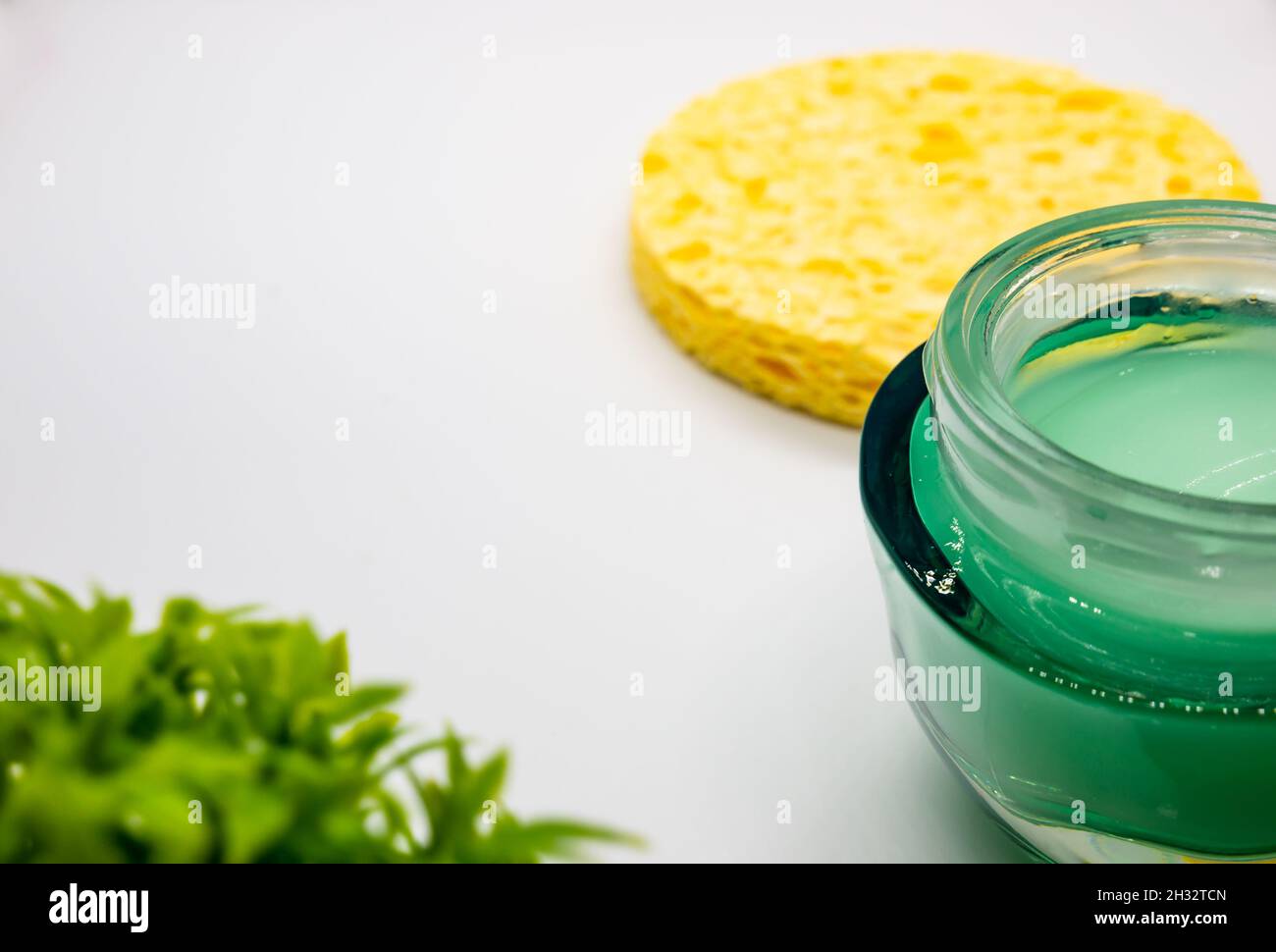 spa related objects on white background, Green Body cream and yellow ...