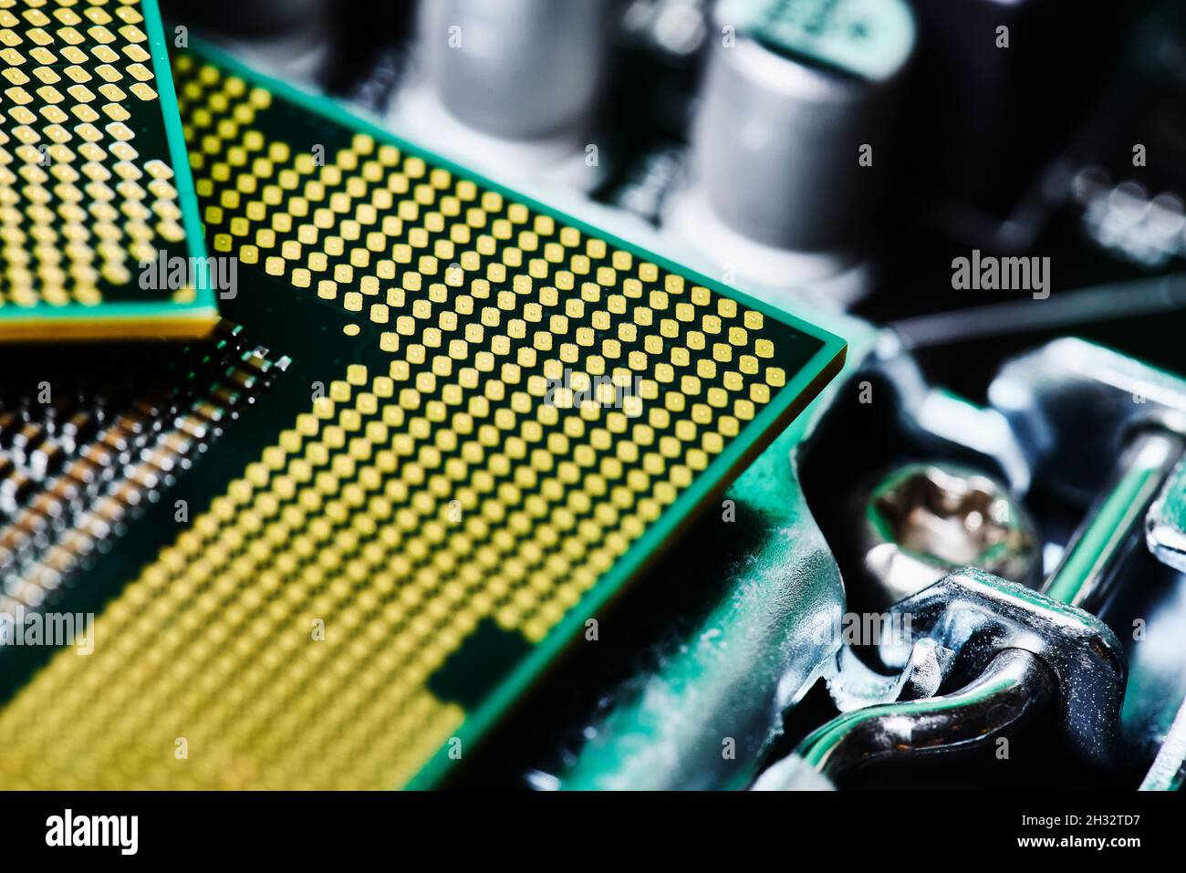 Macro-shot of computer microchip processor. Global chip and semiconductor shortage. Symbol of ...