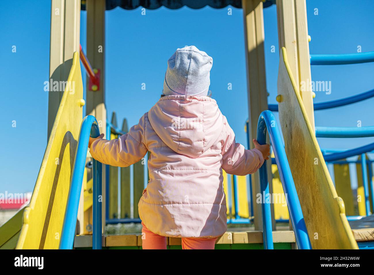 Child on the playground Stock Photo - Alamy