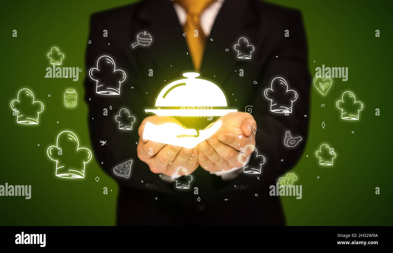 Hand holding food related icons Stock Photo - Alamy