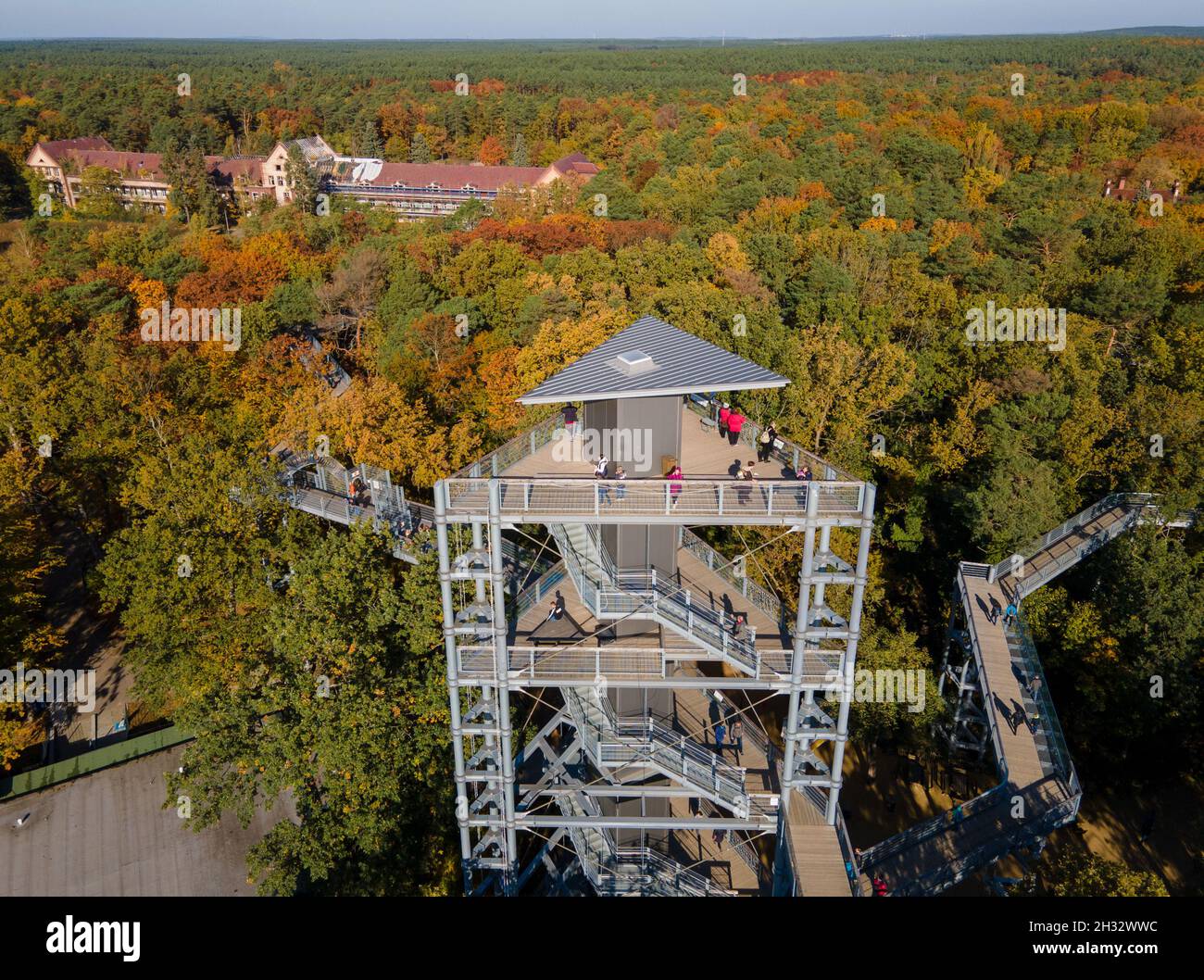 Beelitz, Germany. 25th Oct, 2021. Visitors stand in sunny weather on ...