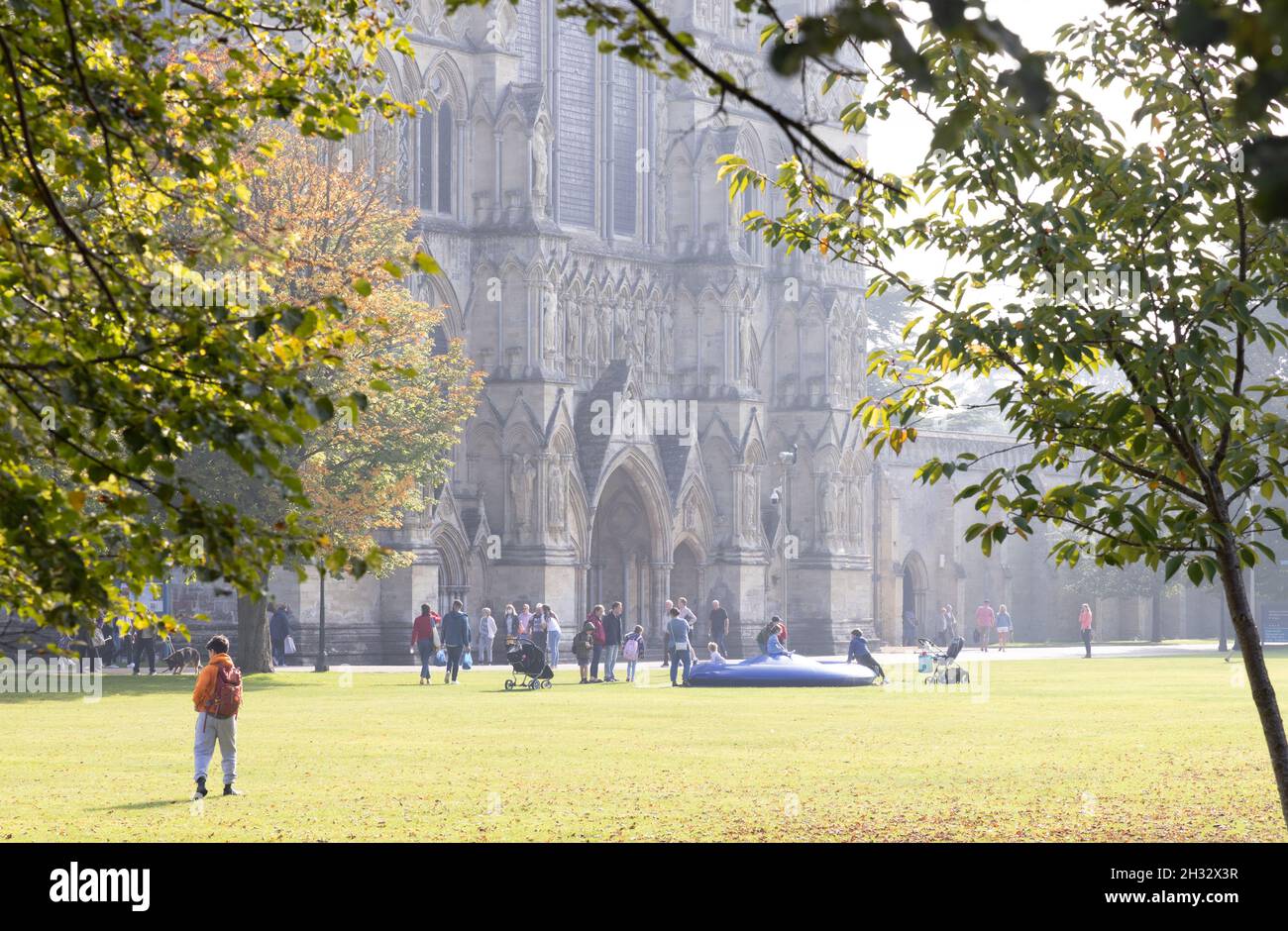 Autumn UK; Salisbury Cathedral UK; seen from the green in autumn ...